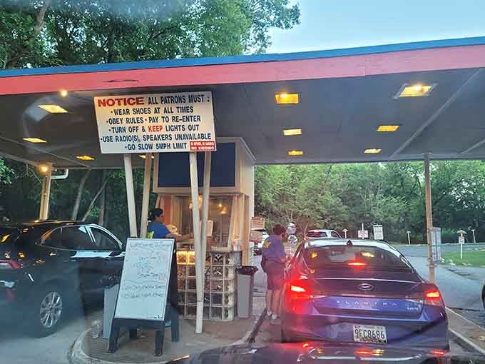 The ticket booth where your evening adventure begins, complete with rules that actually make the experience better.