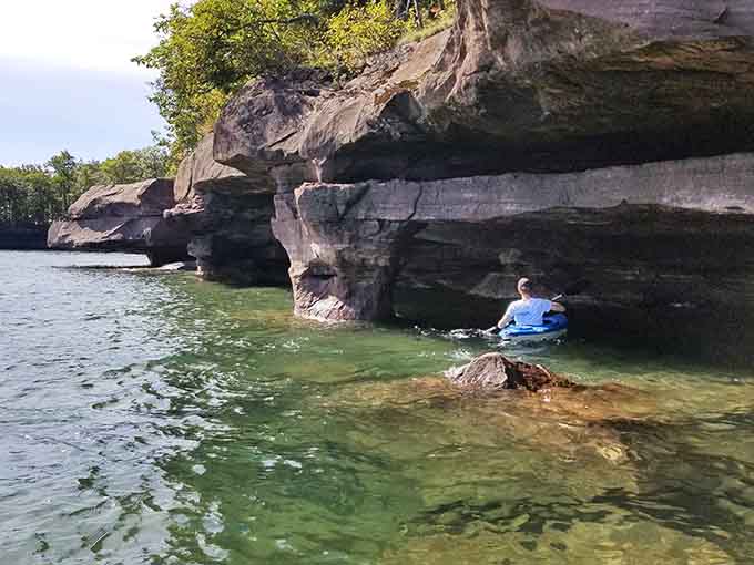 Paddling through these ancient sandstone formations feels like exploring nature's own cathedral, minus the pews and organ music.