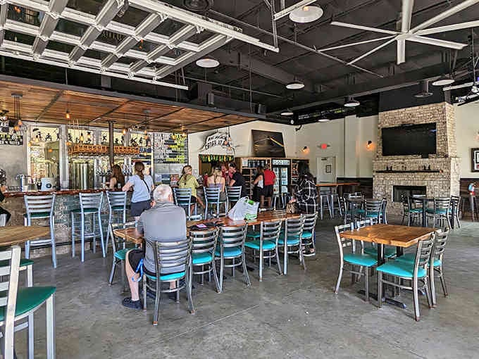 Industrial meets coastal in a space where exposed beams and natural light create the perfect beer-drinking atmosphere.