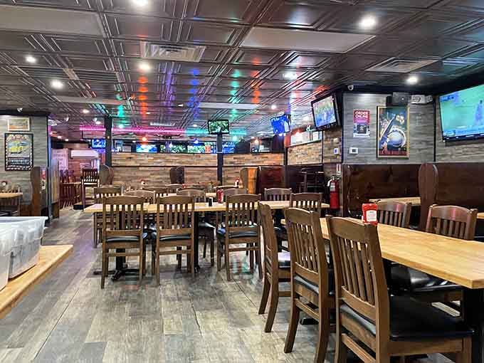 Modern comfort meets classic barbecue vibes with wooden tables, TVs, and that welcoming come-as-you-are atmosphere.