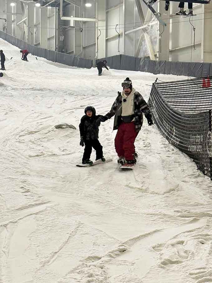 Teaching the next generation that winter sports don't require actual winter, just determination and climate control technology.