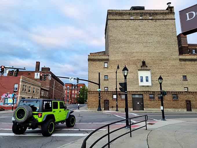 Downtown Binghamton where that lime-green Jeep costs more than three months' rent and nobody thinks that's weird.