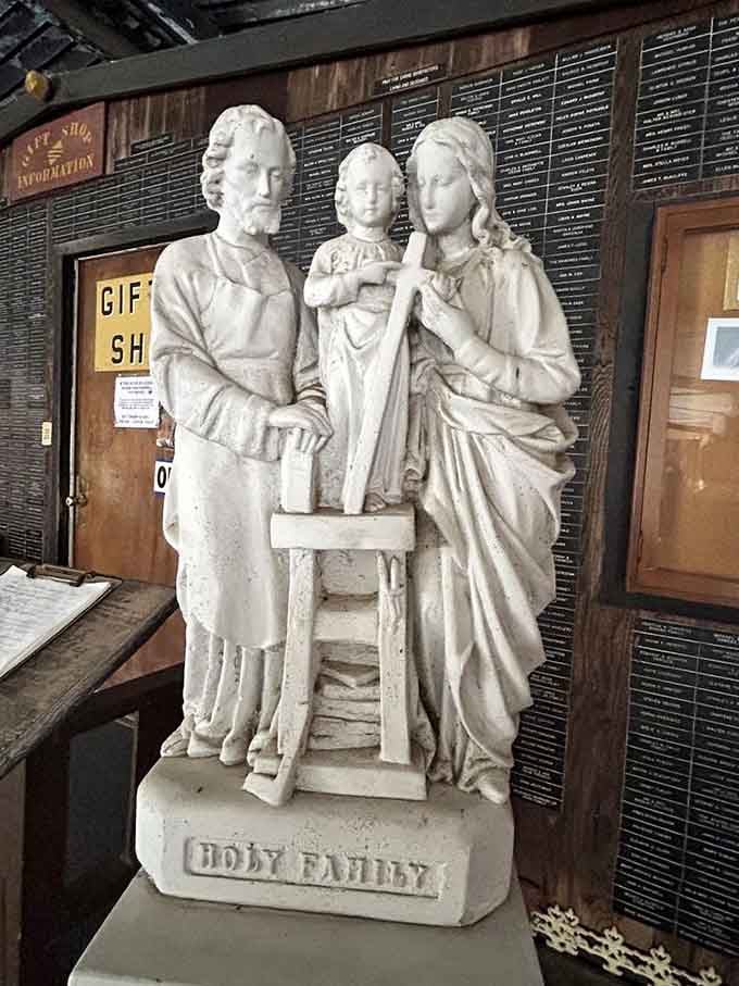The Holy Family statue stands watch in the information center, a serene welcome committee for weary travelers.