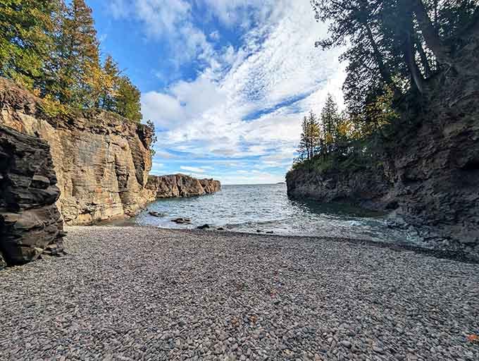 Standing between these towering cliffs feels like discovering your own private slice of Lake Superior paradise.