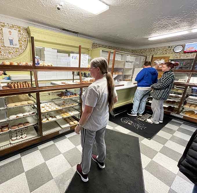 Step inside and the checkered floor tells you everything: this is where real baking happens, no frills required.