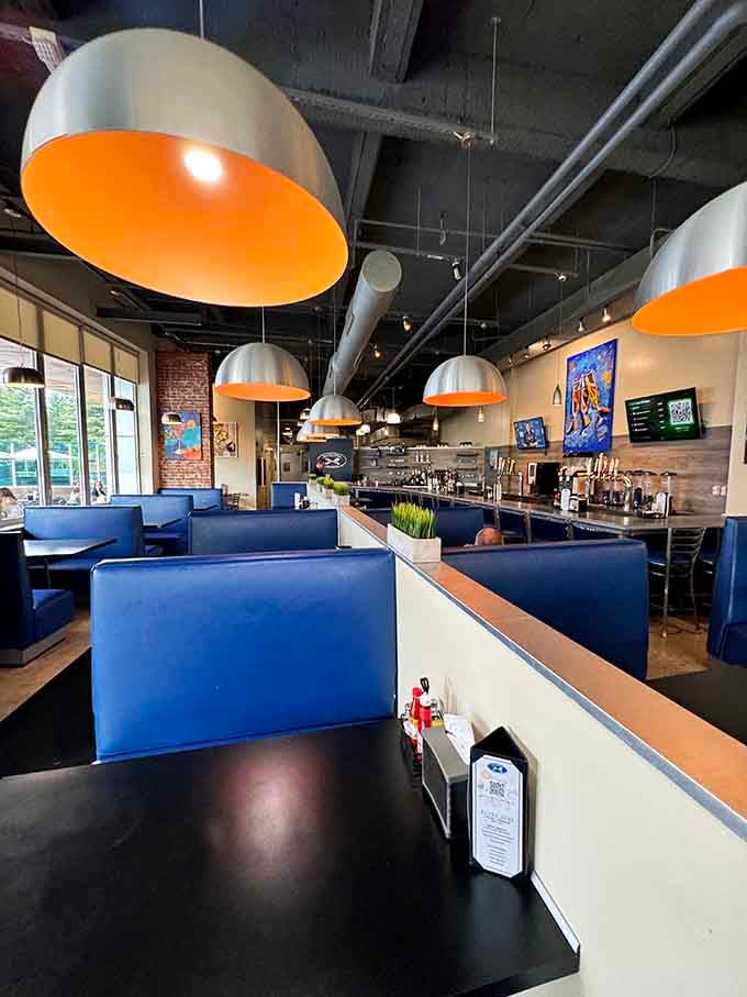 Those orange-glowing pendant lights create the perfect ambiance for devouring biscuits and gravy in style.