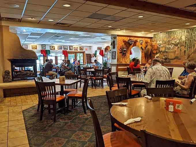 Step into a dining room where colorful artwork meets comfortable seating and every table tells a story.