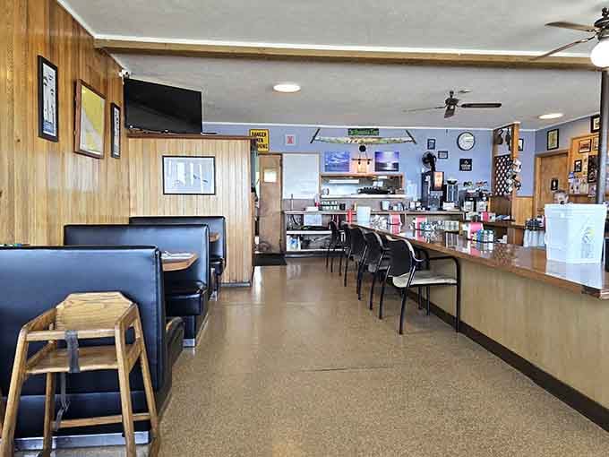 Classic diner vibes with wood paneling and vinyl booths where locals have claimed their favorite spots for years.