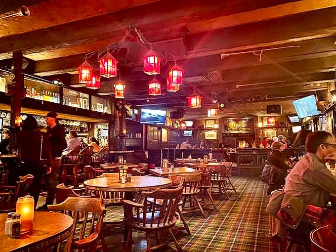 Dark wood, red lanterns, and plaid carpeting create the coziest atmosphere this side of the Atlantic Ocean.
