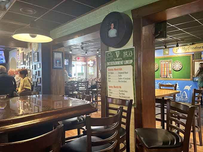 Dark wood, warm lighting, and dartboards ready for action, this is what a real Irish pub looks like, folks.