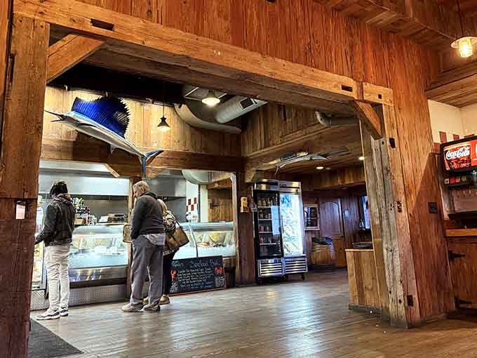 Step inside and you're transported to a coastal fish house, complete with maritime charm and that unmistakable seafood aroma.