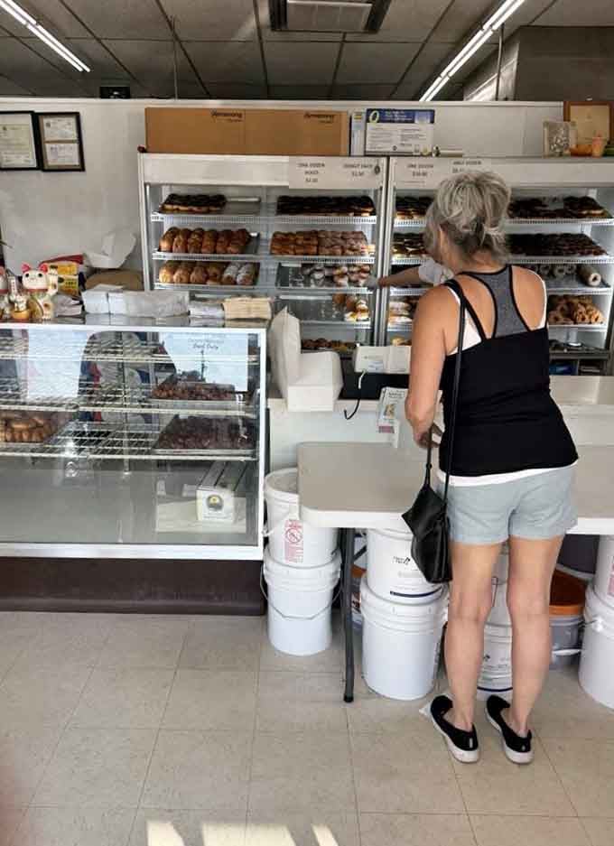 Clean, efficient, and focused on what matters most: those beautiful rows of fresh donuts waiting in the display cases.