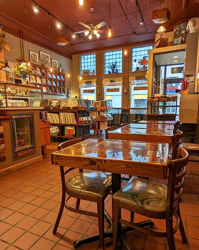 Where vinyl meets caffeine in perfect harmony, creating the kind of atmosphere that makes hours disappear like magic.