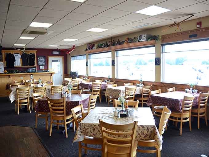 Those windows aren't just for show&mdash;they're your front-row seats to aviation magic while you eat.