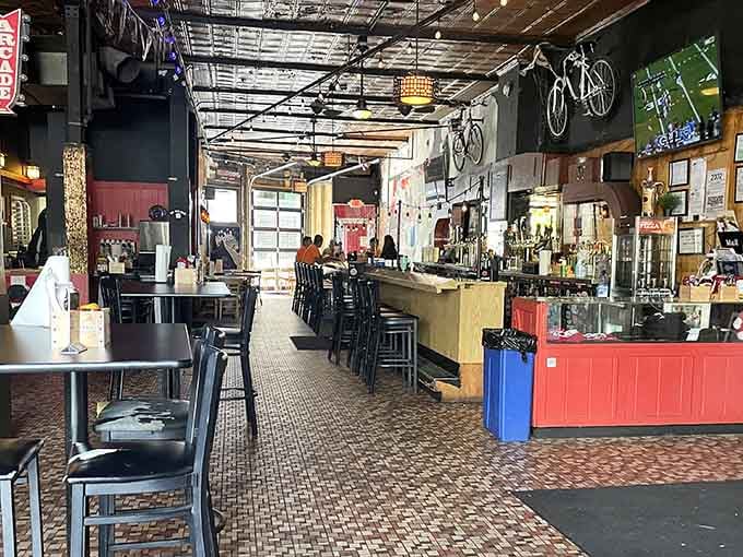 Industrial chic meets retro charm with soaring ceilings and an open layout that says "stay awhile, play longer."