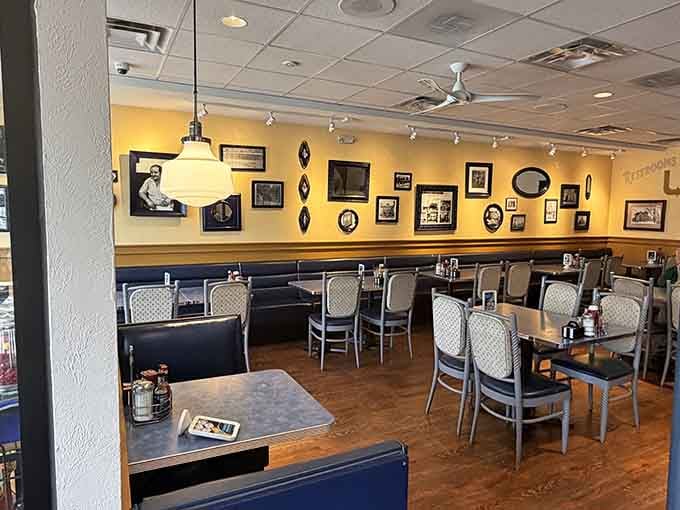 Cozy booths, warm lighting, and walls filled with character make this dining room feel like a Mediterranean home.