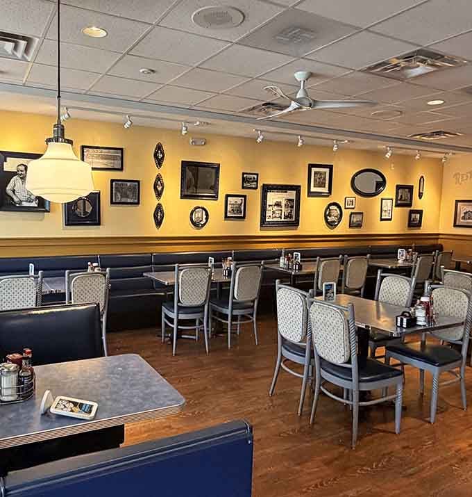 Golden walls and vintage photographs create the kind of timeless diner atmosphere that makes you want to linger.