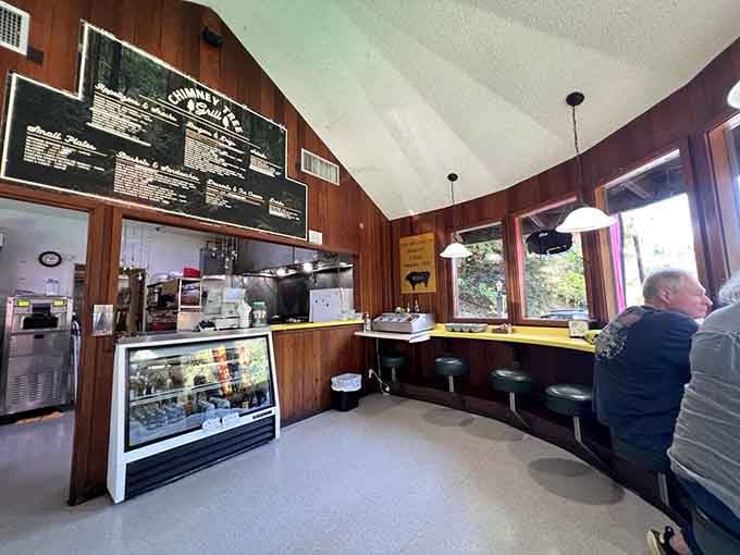 Wood paneling, counter seating, and windows framing ancient trees&mdash;this is what roadside dining dreams are made of, folks.