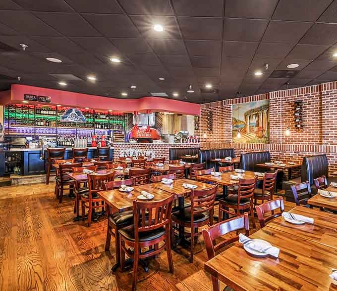 Exposed brick, warm wood, and that inviting glow that says "sit down, relax, you're about to eat really well."
