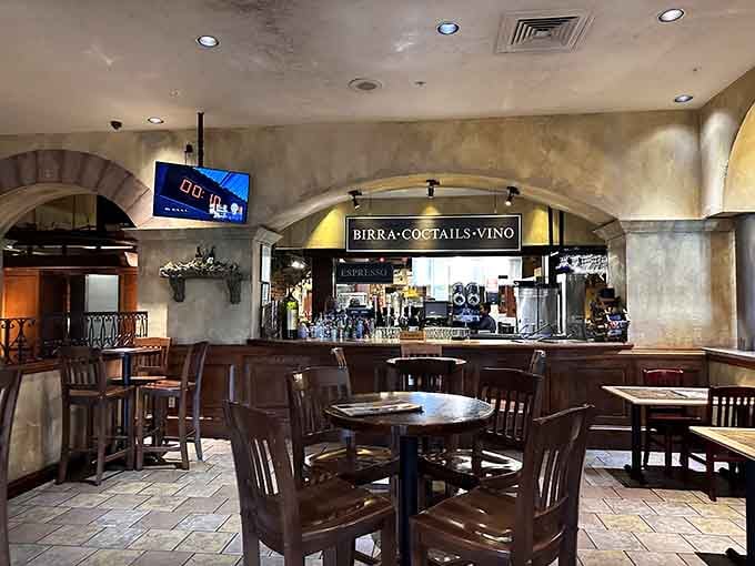 The rustic archways and warm lighting create an atmosphere that whispers "relax, you're about to eat very well."