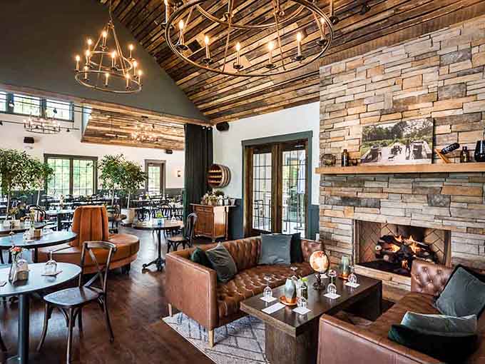 Leather couches, soaring ceilings, and a fireplace that says "stay awhile" louder than your favorite aunt at Thanksgiving.