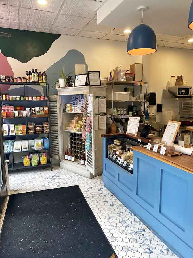 Hexagonal tiles, shelves of goodies, and that blue counter where carb dreams come true every morning.
