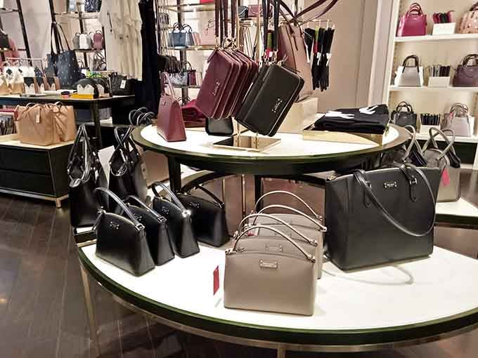 Behold the handbag display that could make even the most disciplined shopper reconsider their entire budget strategy.