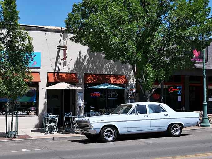 Classic cars and historic storefronts create a time machine you can actually park in and explore all afternoon.