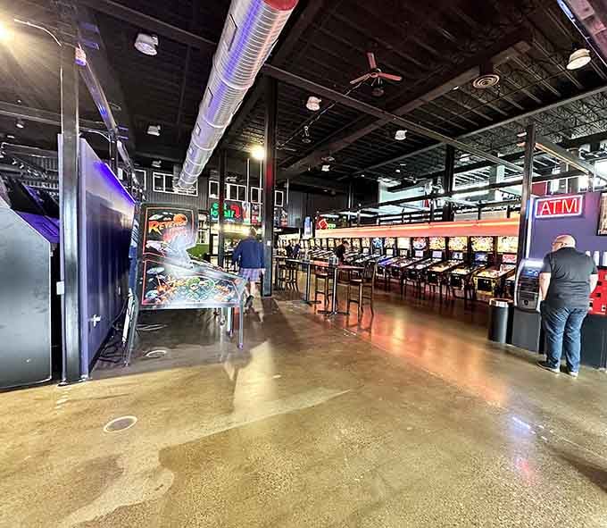 Step inside and witness rows of pinball machines standing at attention, ready to test your flipper skills and patience.