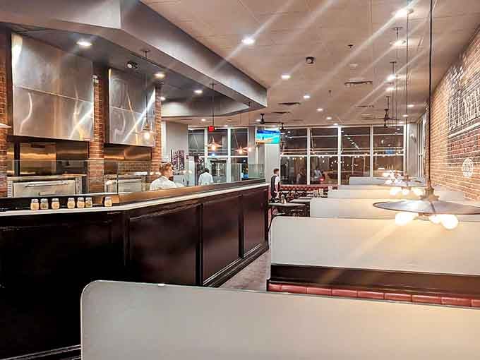 The gleaming open kitchen and spacious dining room prove tradition can look absolutely modern and inviting.