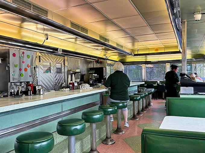 Classic green vinyl booths and counter stools where countless breakfast dreams have come true over the decades.