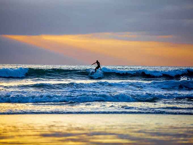 Golden hour meets golden waves, and suddenly you understand why people write songs about this place.