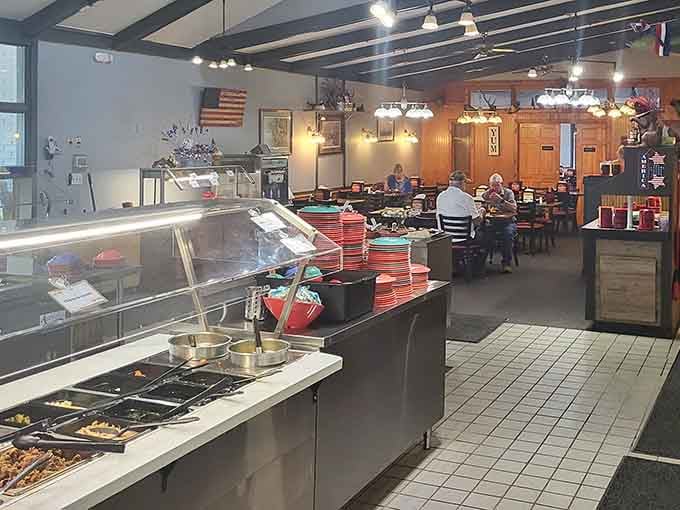 The buffet stretches before you like a delicious promise, with patriotic d&eacute;cor watching over your culinary adventure.