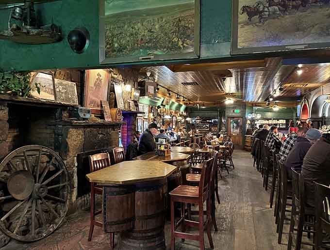 Wagon wheels overhead, barrel tables below, this is what happens when atmosphere actually earns its keep.