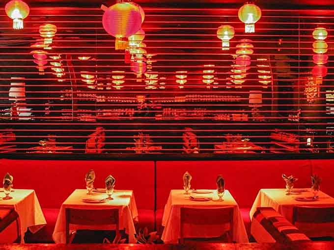 Step into this neon-drenched wonderland where traditional lanterns meet modern design in the most Instagram-worthy way possible.