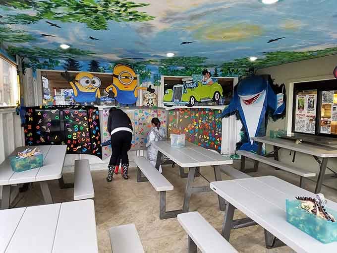 Minions, sharks, and checkered tables create a vibe that's pure joy meets comfort food heaven.