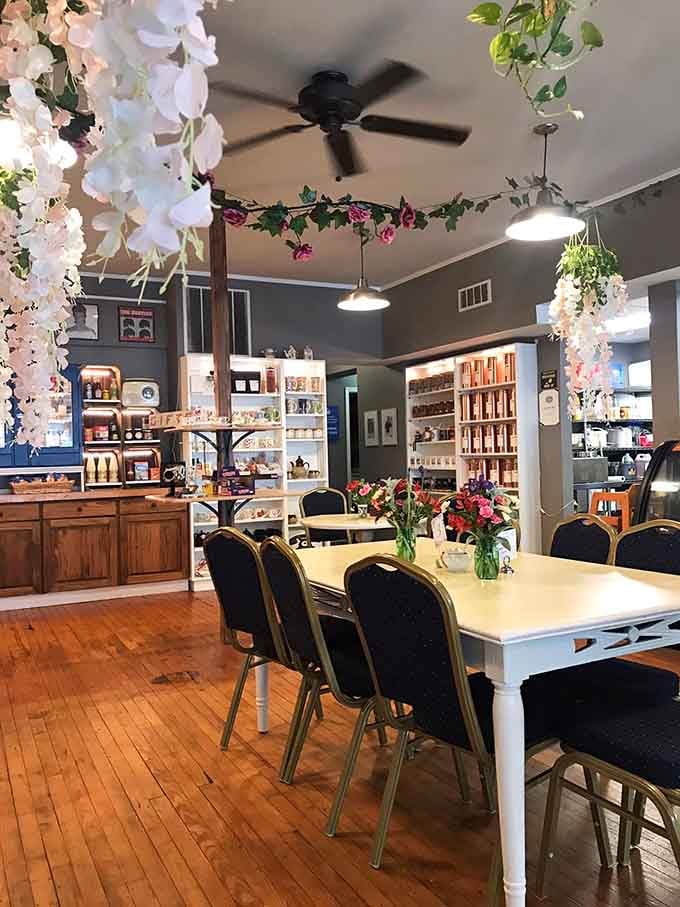 Floral garlands and wooden floors create the kind of cozy English tearoom atmosphere that makes you want to linger for hours.