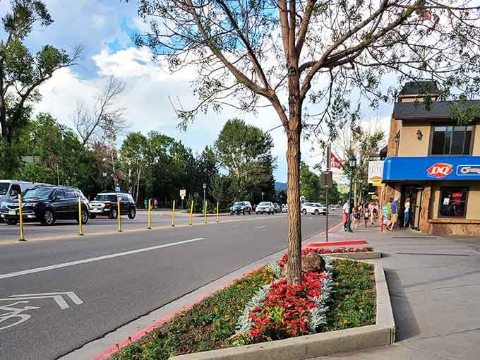 Those flower beds don't plant themselves, proving that even mountain towns understand the assignment when it comes to curb appeal.