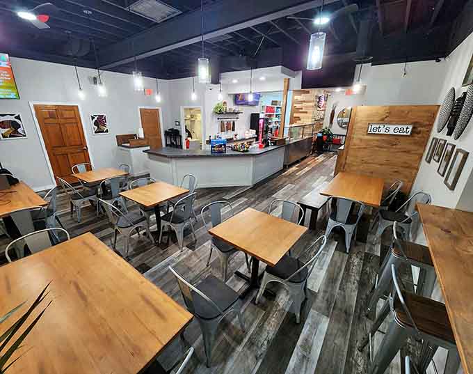 Clean, modern, and inviting, this cozy dining room proves you don't need cathedral ceilings to create a welcoming atmosphere.
