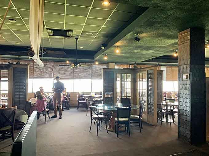 Floor-to-ceiling windows frame the waterfront like a living postcard, making every table feel like the best seat in the house.