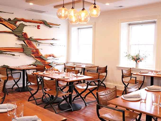 Clean lines, warm wood, and artistic touches create a space where comfort meets sophistication effortlessly.