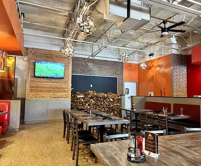 Wood-fired dreams happen here, where exposed brick meets actual firewood and your burger gets the campfire treatment it deserves.