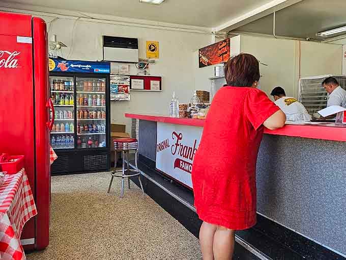 Step inside and travel back to when pizza parlors were neighborhood living rooms, complete with checkered charm.