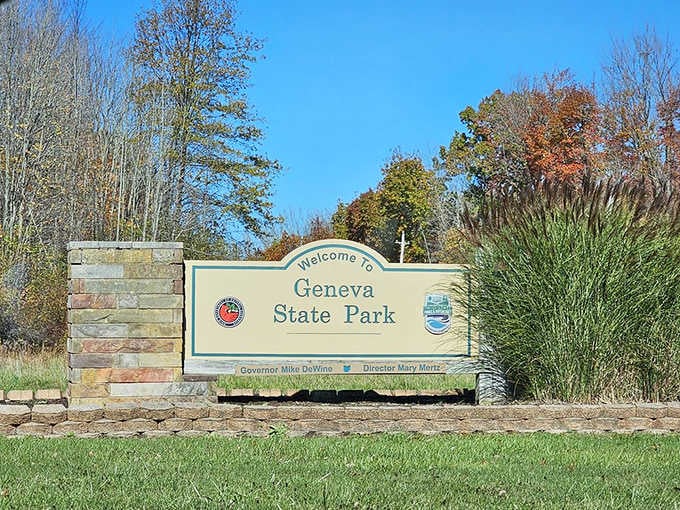 The welcome sign framed by autumn colors promises adventures, and trust me, it delivers on every word.