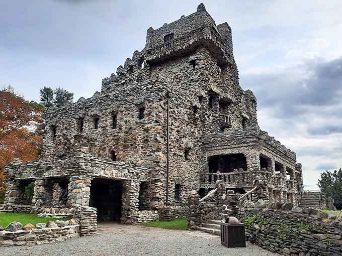 Stone towers and turrets create a silhouette that belongs in the Rhine Valley, not the Connecticut River Valley.