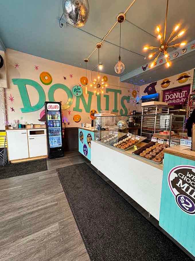 Step into a retro wonderland where disco balls meet donuts and mid-century starburst lights illuminate your sugar-fueled dreams.