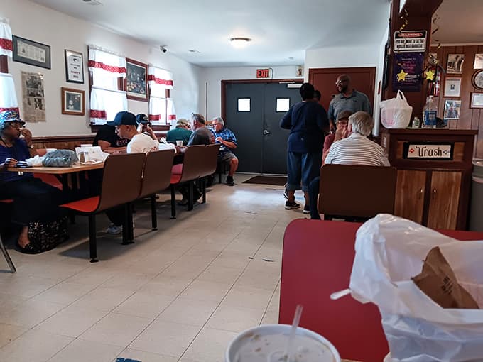 Simple tables, happy diners, and walls full of memories create the perfect backdrop for legendary barbecue experiences.