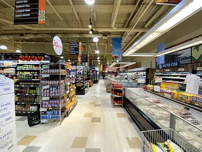 These gleaming aisles stretch out like an invitation to explore flavors your regular grocery store never dreamed of stocking.