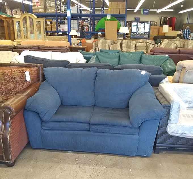 A sea of sofas in every style imaginable, waiting to become the centerpiece of someone's living room.