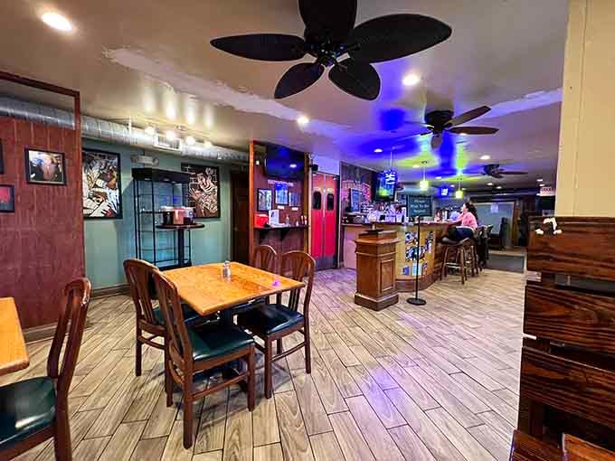 Wood tables, ceiling fans, and mood lighting create the perfect setting for serious comfort food consumption.